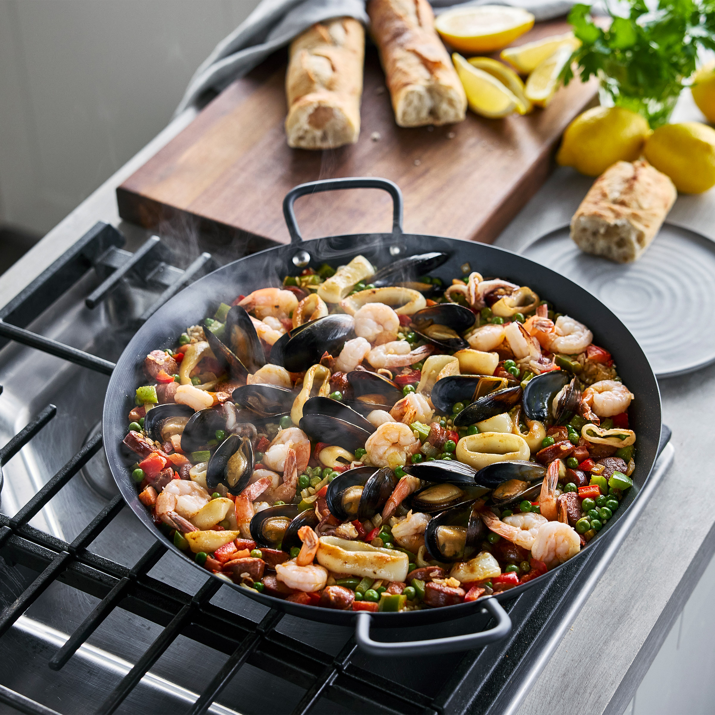 GreenPan 15” Pre-seasoned Carbon Steel Paella Pan | Costco