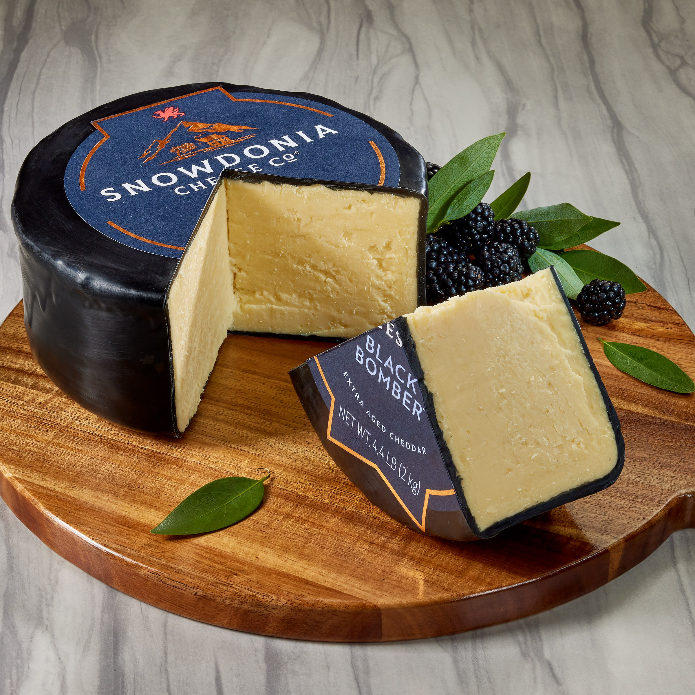 Snowdonia Black Bomber Cheese, Full Wheel, Approximately 4.4 lbs. | Costco